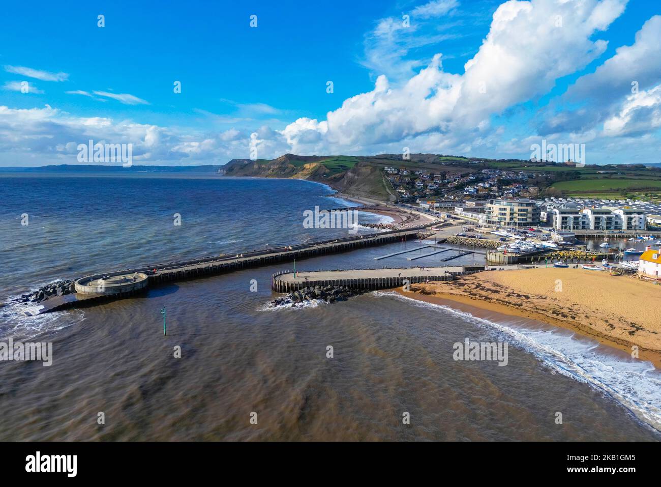 West Bay, Dorset, UK. 3rd November 2022. UK Weather. View from the air of the beach and harbour ...