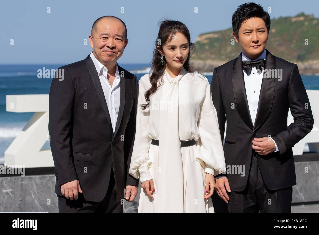 (L-R) Director Jie Liu, actress Mi Yang and actor Jingfei Guo attends ...