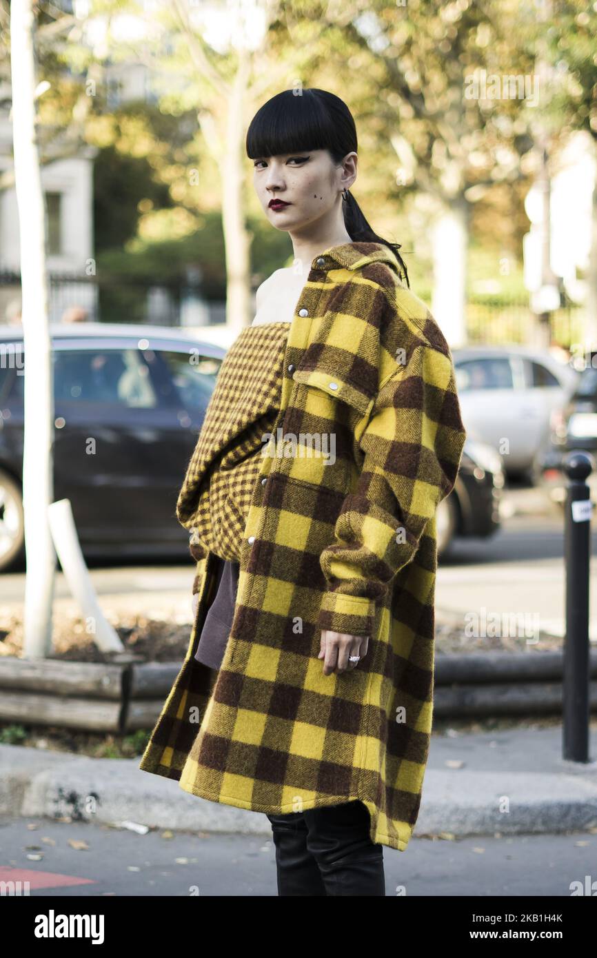 Kozue Akimoto seen in the streets of Paris during Paris Fashion Week ...