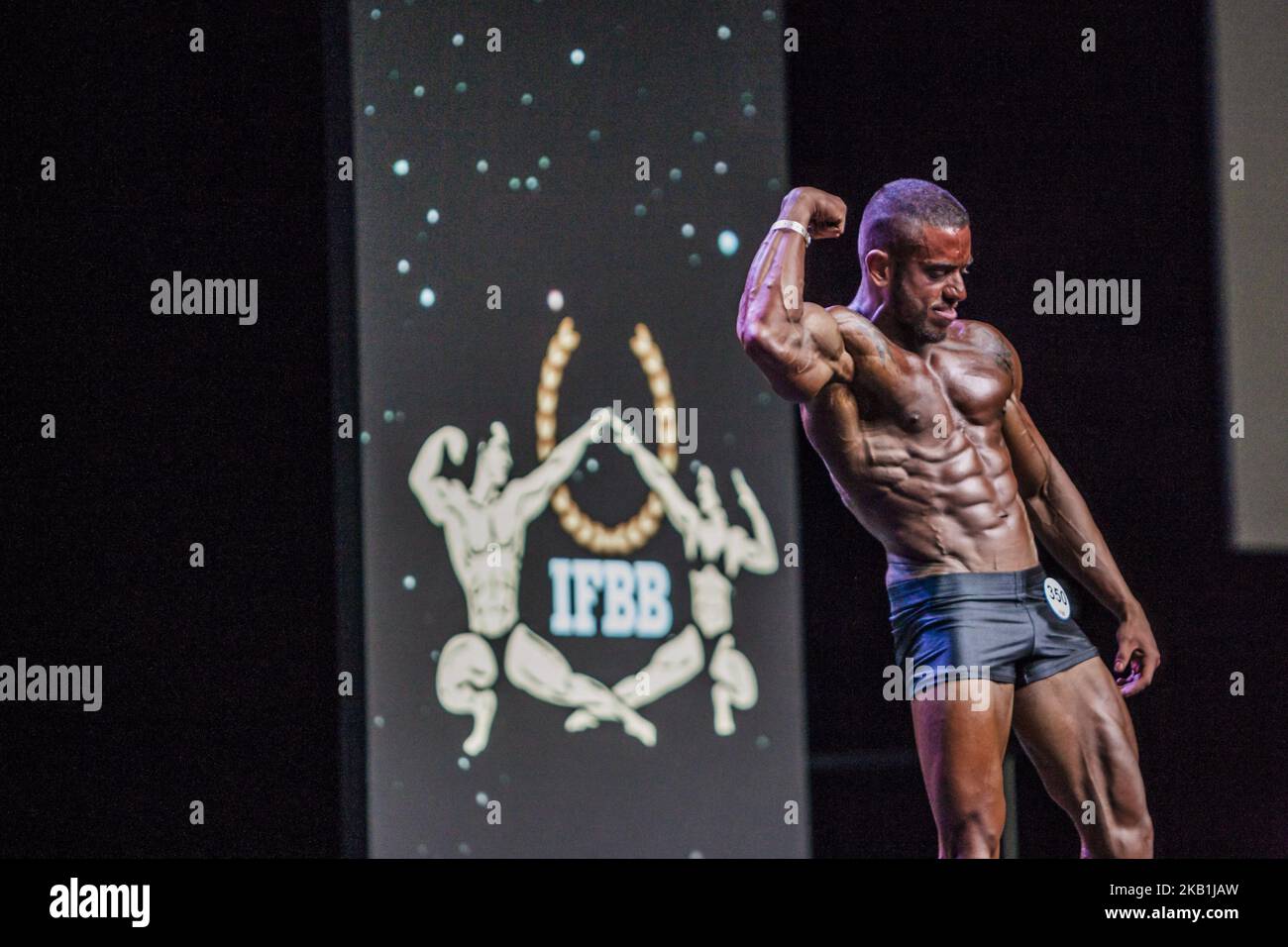 Male bodybuilding athlete posing during the "Arnold Classic Europe ...