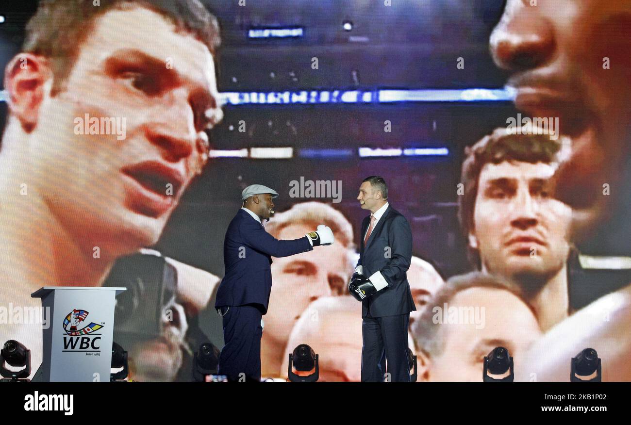 Ex heavyweight boxing champion Lennox Lewis (L) and Kiev's Mayor and ex ...