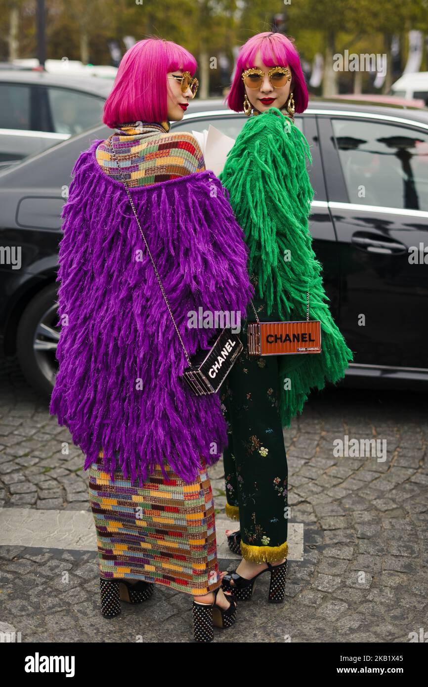 Amiaya twins are seen on the street during Paris Fashion Week SS19 ...