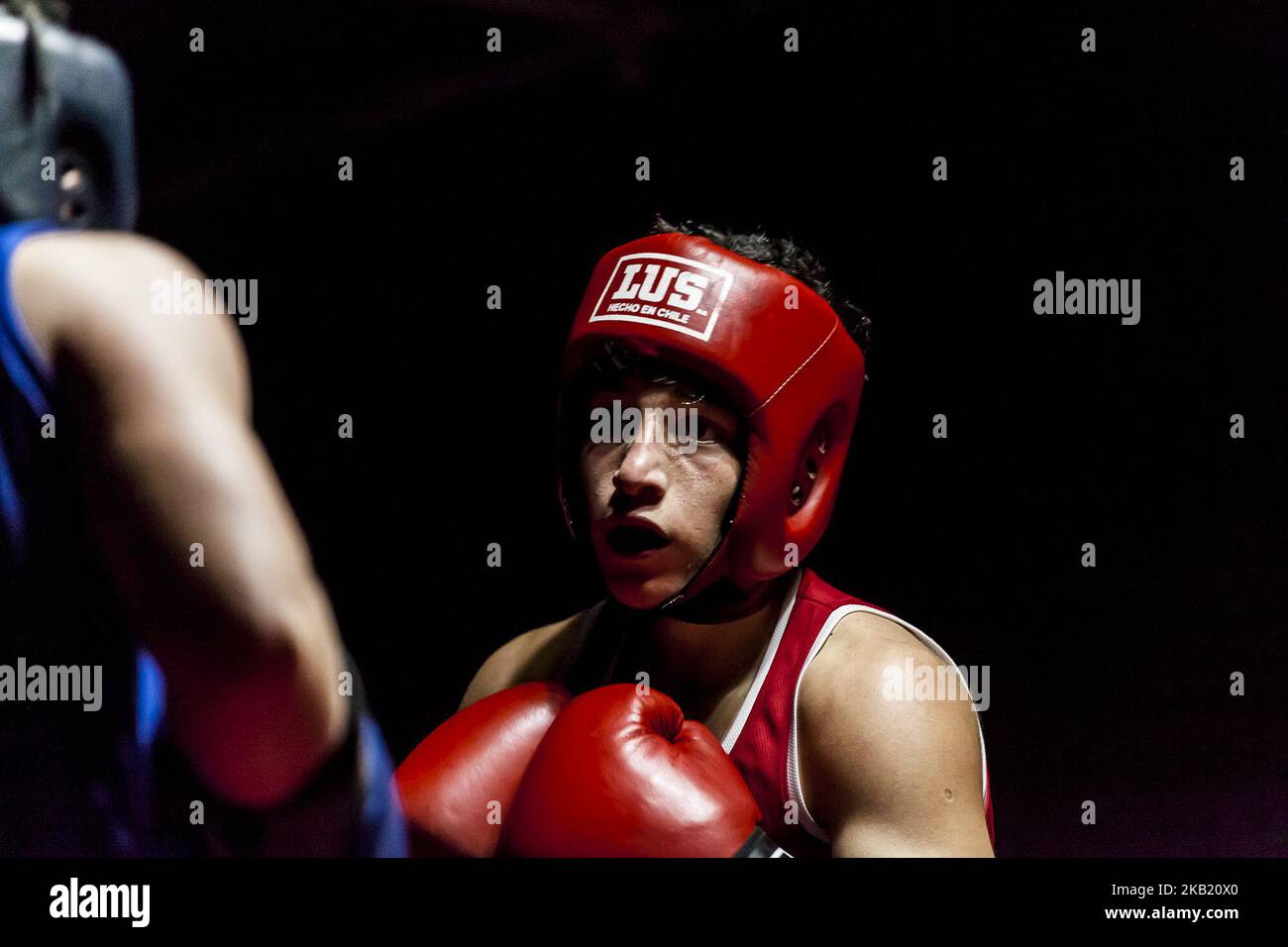 Amateur boxers from different Chilean clubs fought at the Prat-Lautaro ...