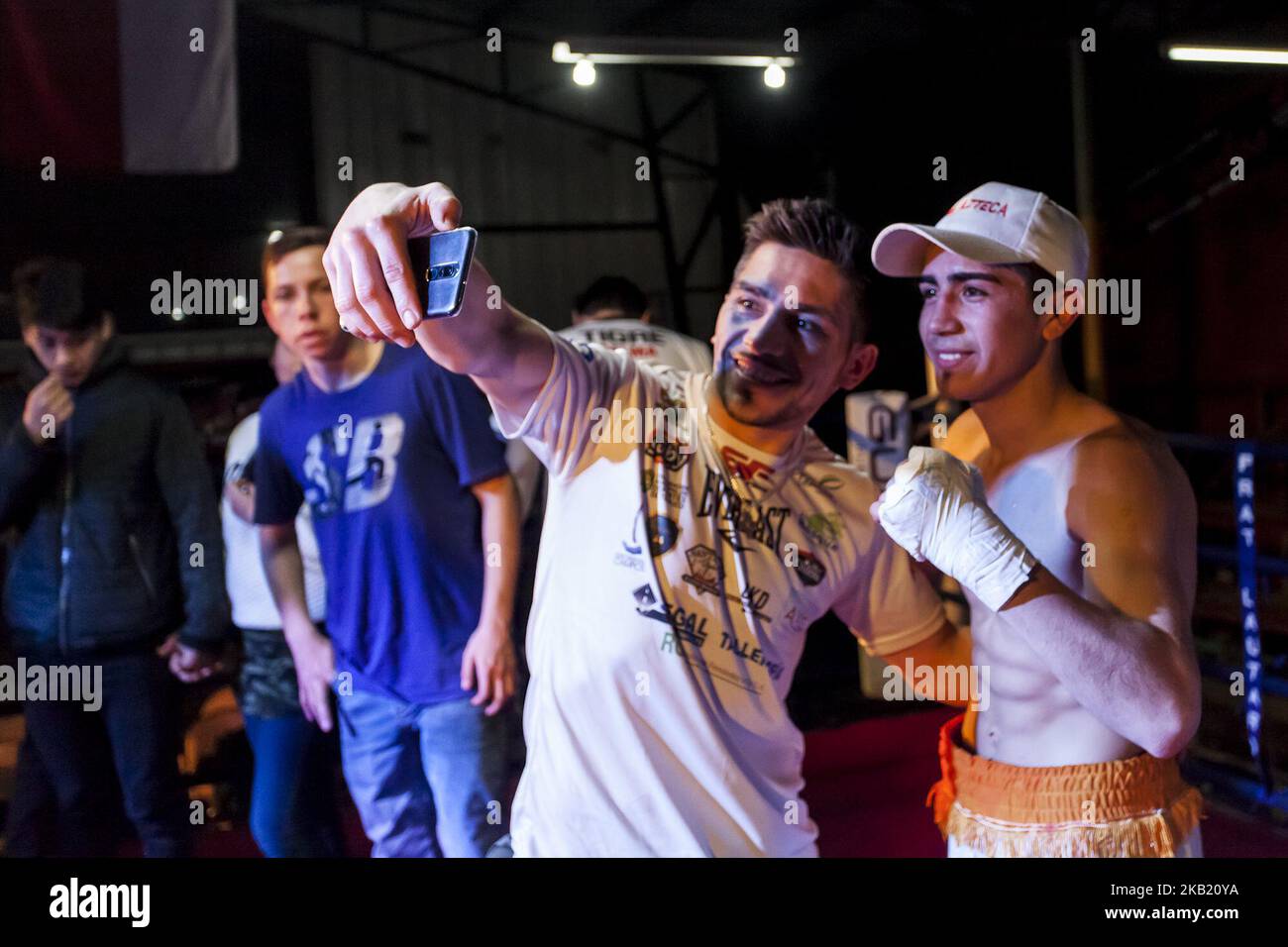 Claudio Laviñanza takes pictures with his fans. Claudio "Azteca ...