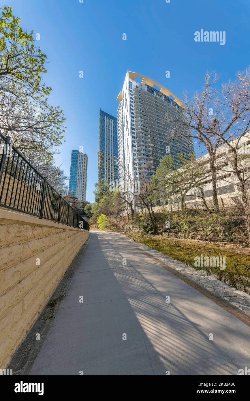 Railing along paved walkway hi-res stock photography and images - Alamy