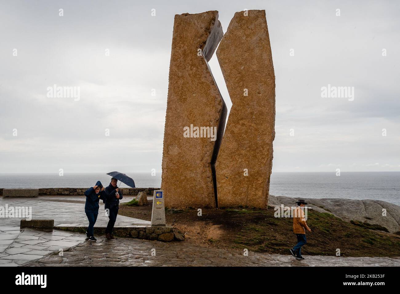 In Muxia, the zero kilometer marker, with the Monument to the Prestige ...