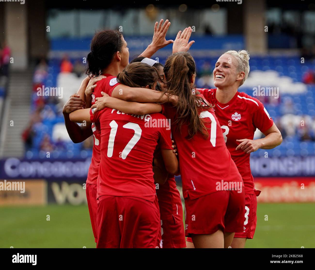 Christine Sinclair of Canada celebrates her goal with Sophie Schmidt of ...