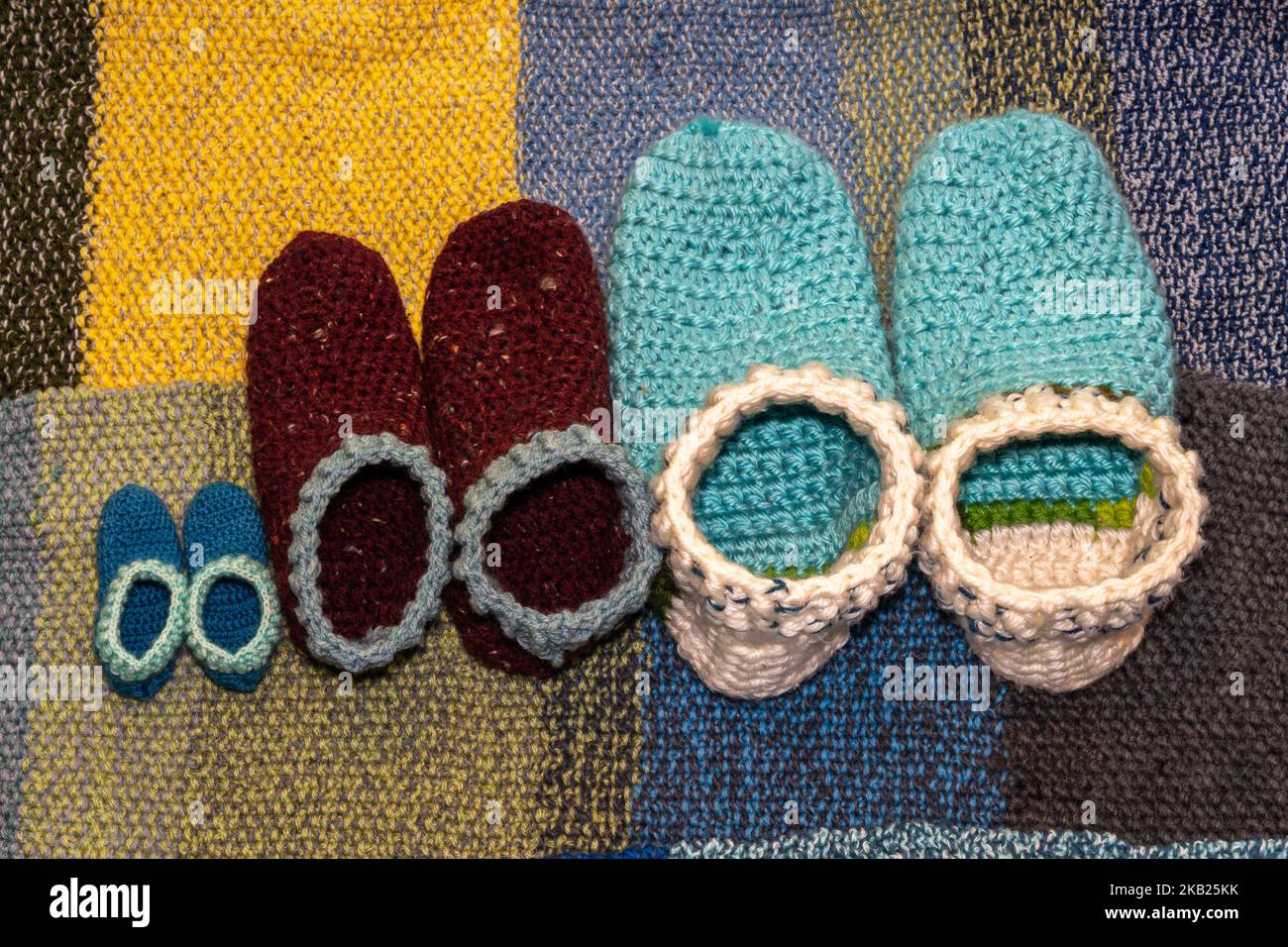 Warm, handmade, colorful woolen slippers for the whole family on soft ...
