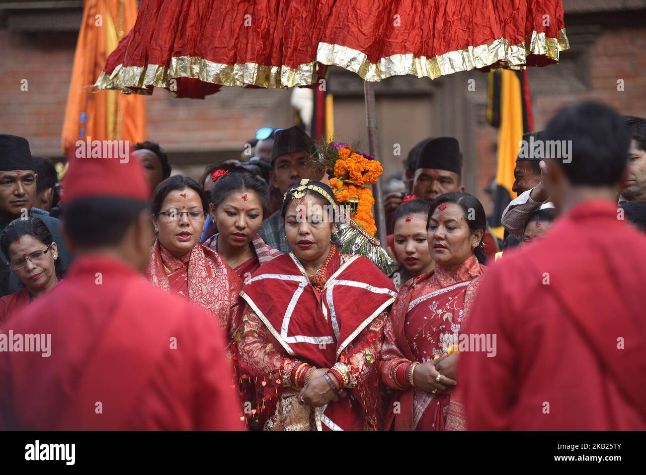 Nepalese devotees sings traditional songs as priests carrying Fulpati ...