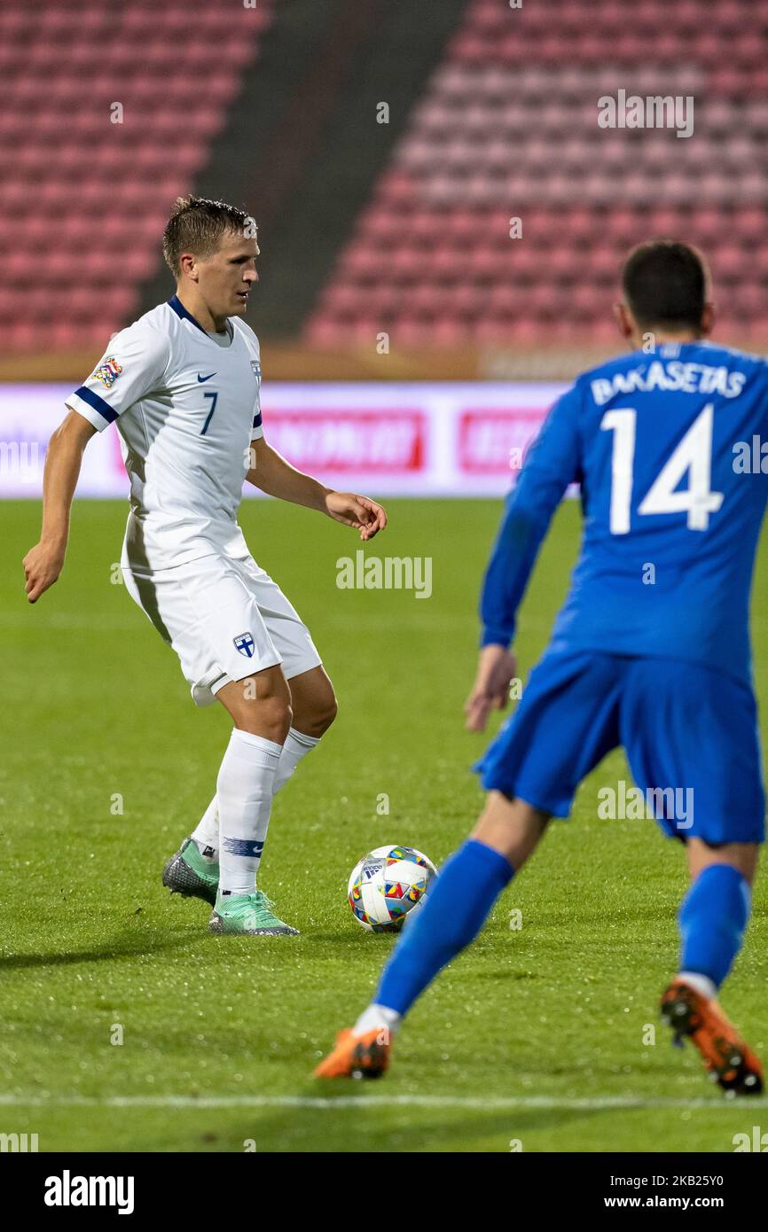 Robin Lod (L) of Finland vies Tasos Bakasetas of Greece during the UEFA ...