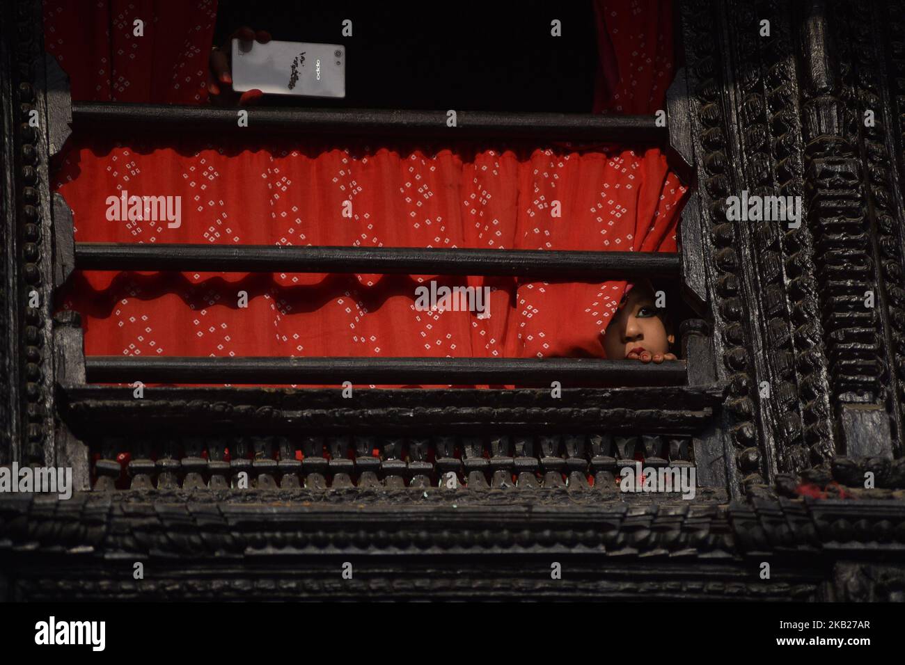 Living goddess of Nepal Trishna Shakya peeps the Dashain Festival ...