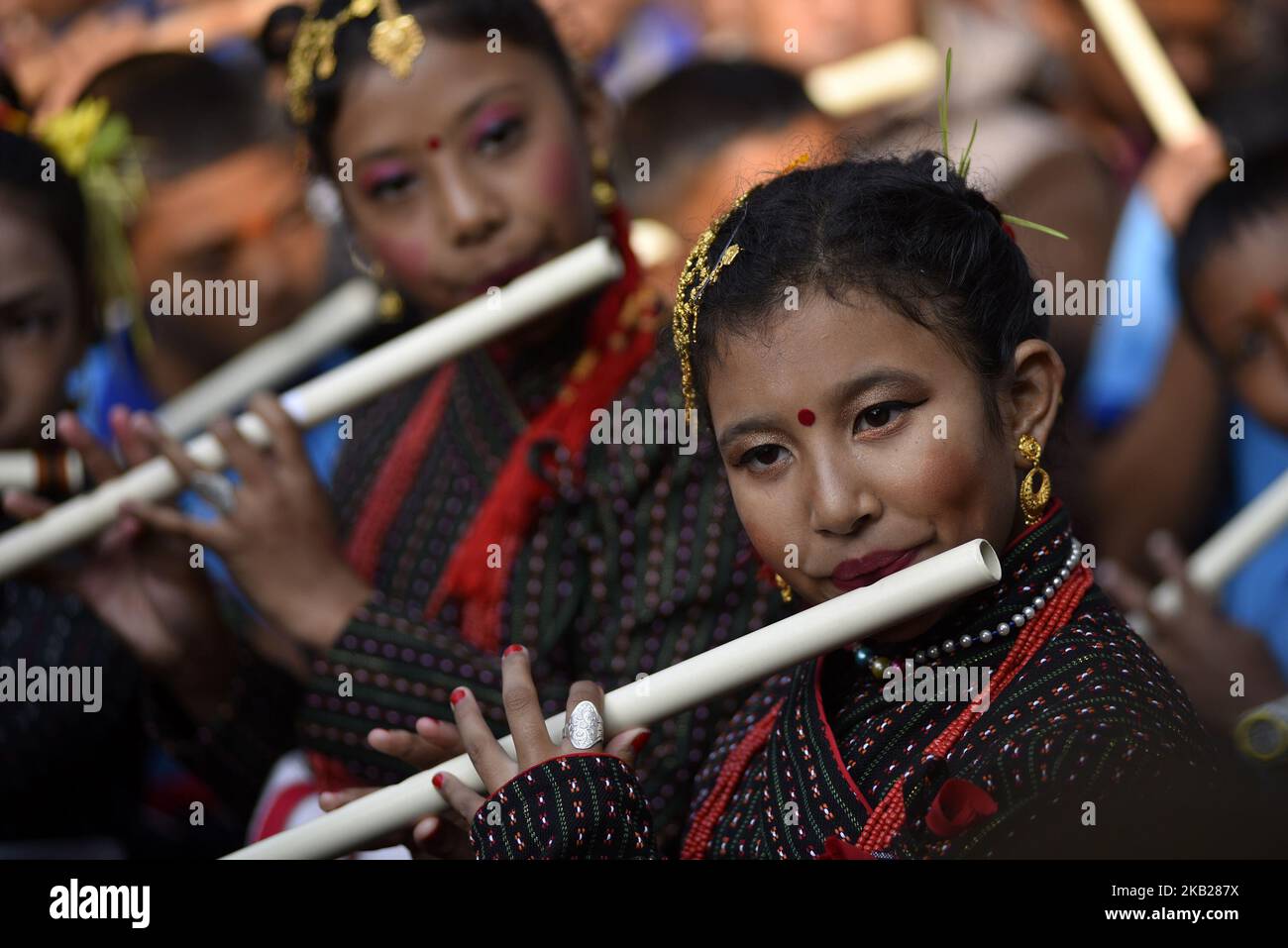 Nepalese devotees plays traditional instruments during the tenth day of ...