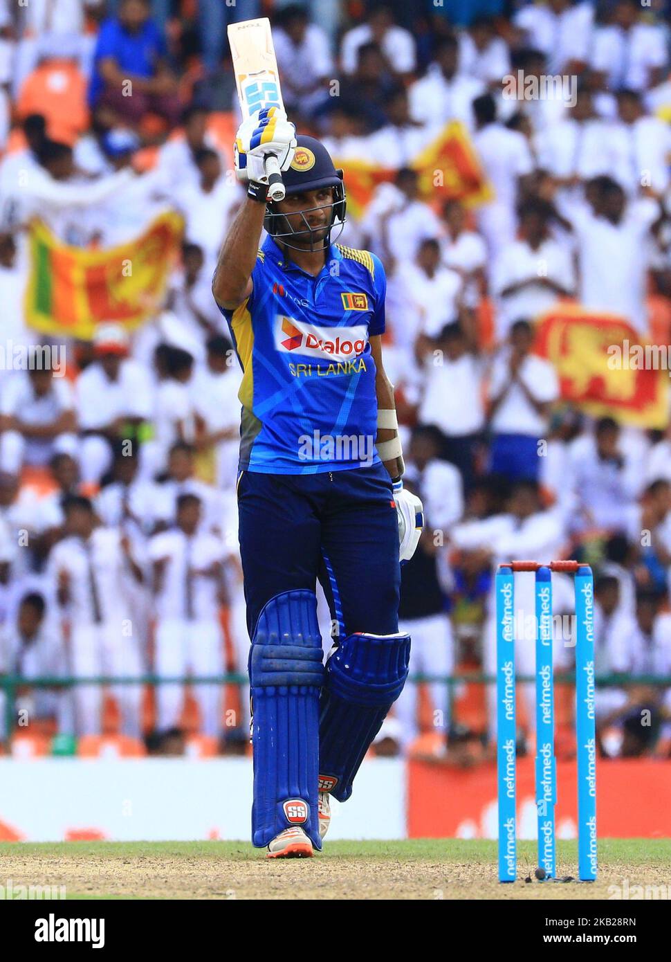 Sri Lankan cricketer Dasun Shanaka celebrates after scoring 50 runs ...