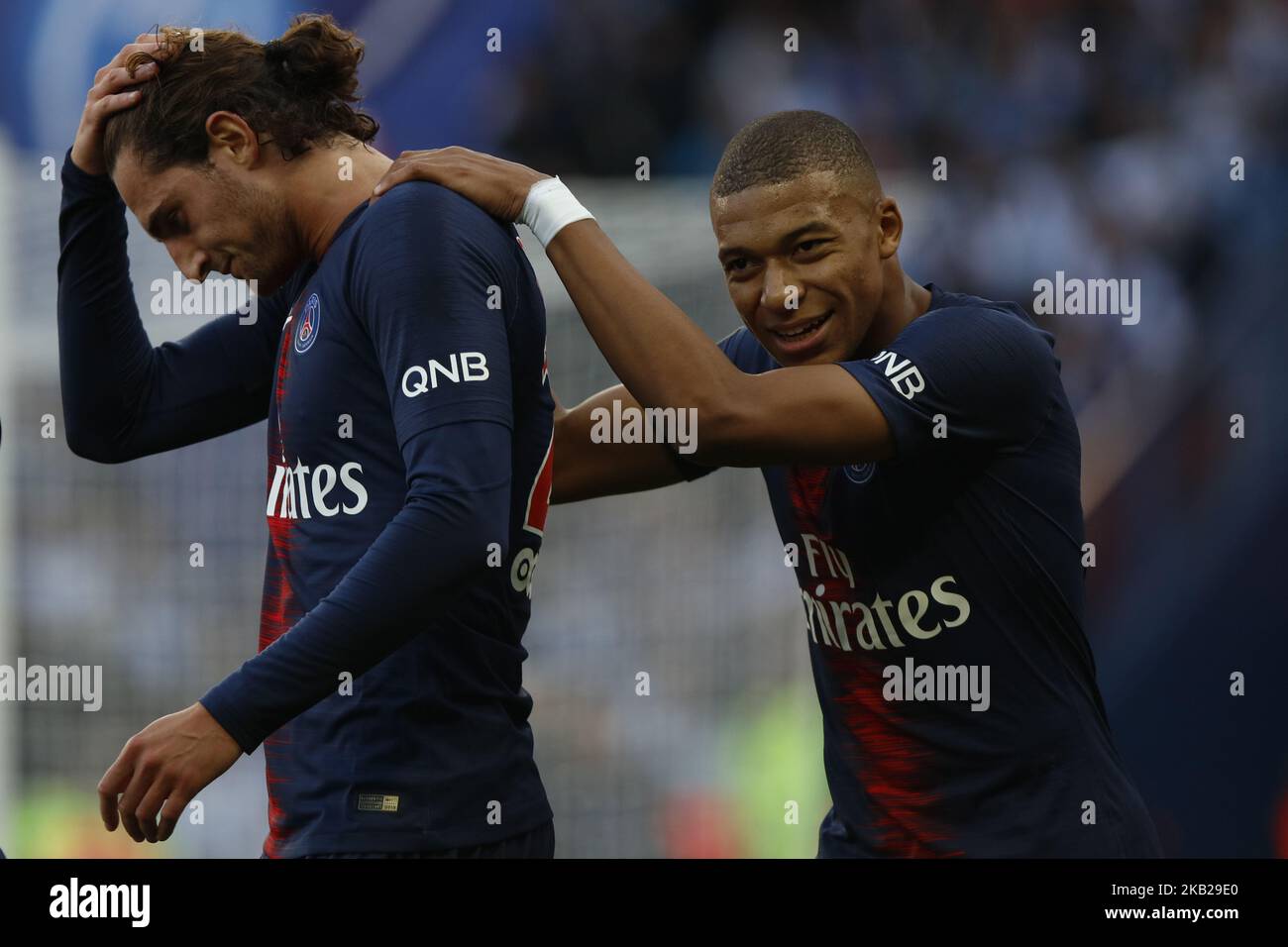 Kylian Mbappe and Adrien Rabiot of Paris Saint-Germain celebrate during ...