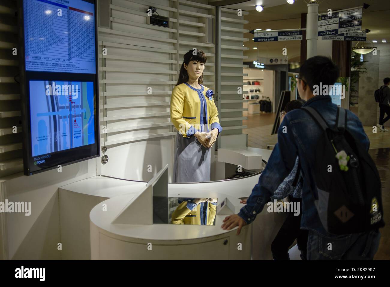 Tourist info desk, operated by a robotic guide Chihira Junco in the ...