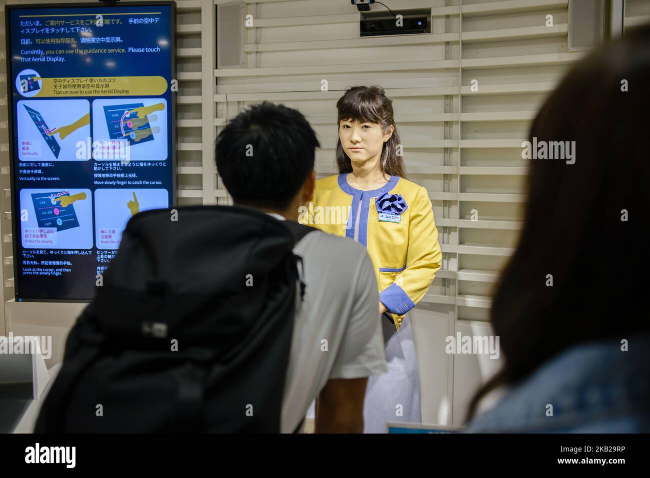 Tourist info desk, operated by a robotic guide Chihira Junco in the ...