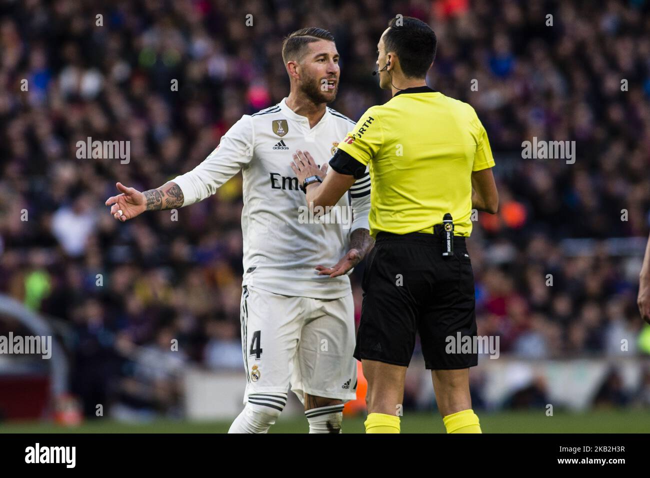 Football referee talking player hi-res stock photography and images - Alamy
