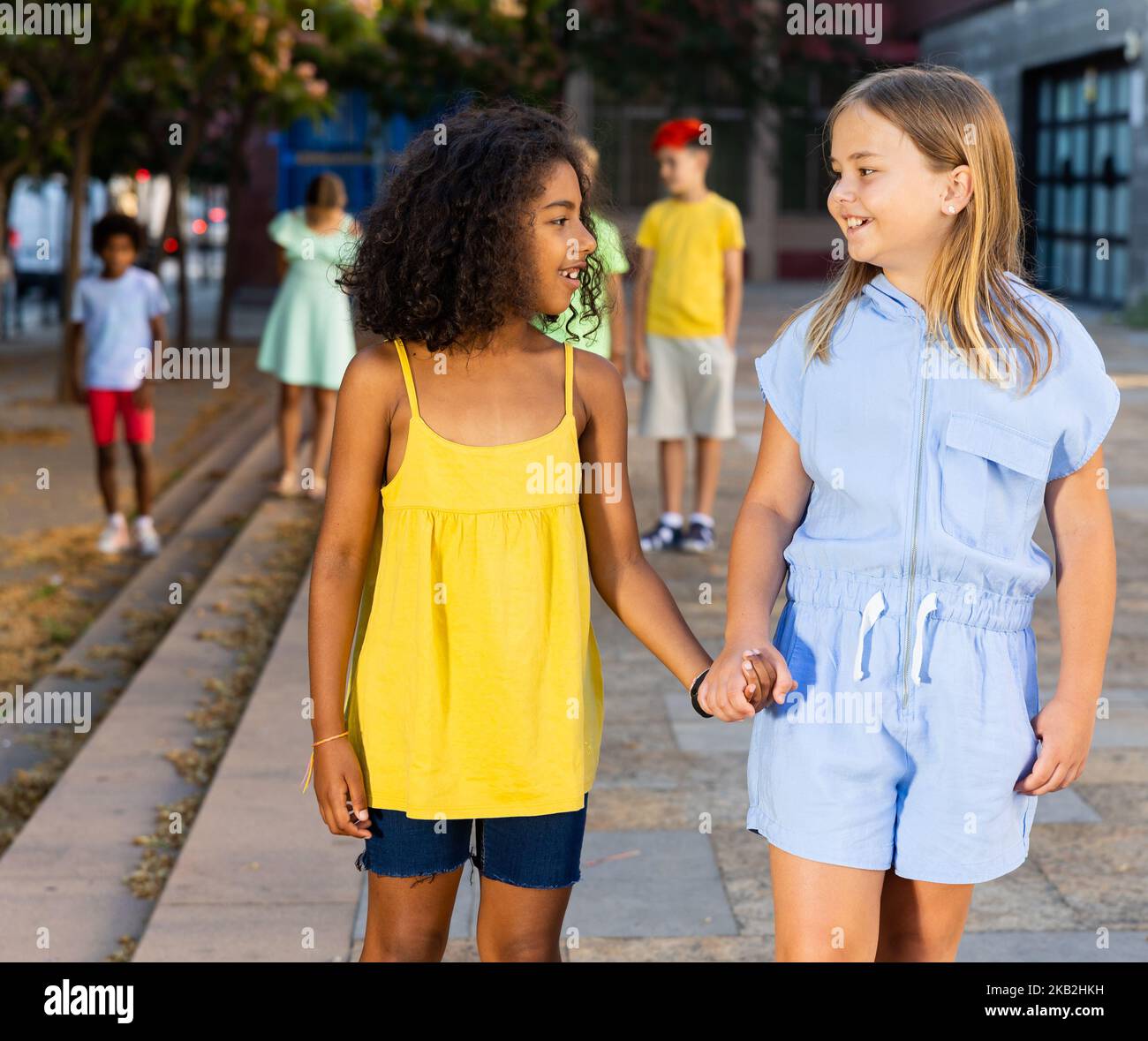 Two girls friendly communicating hi-res stock photography and images ...
