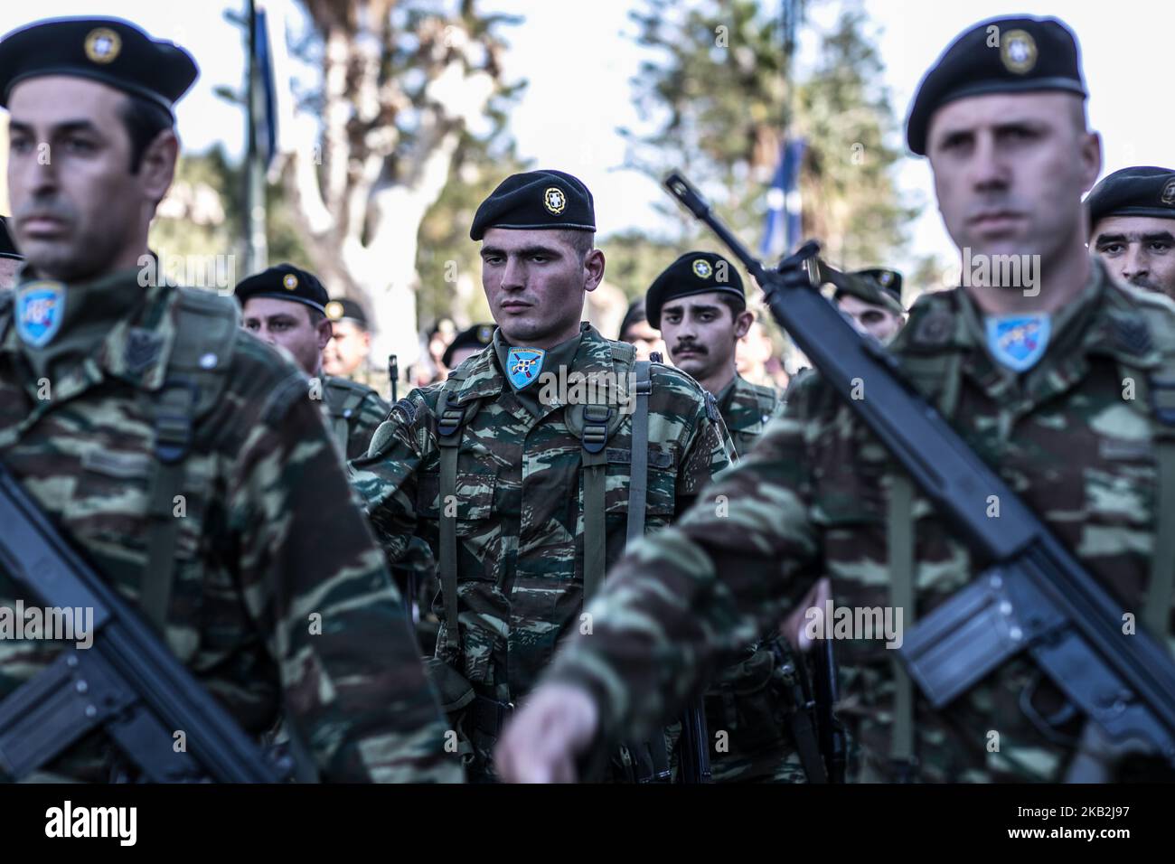 Greek army soldiers take part in a military parade in Kos on October 28 ...