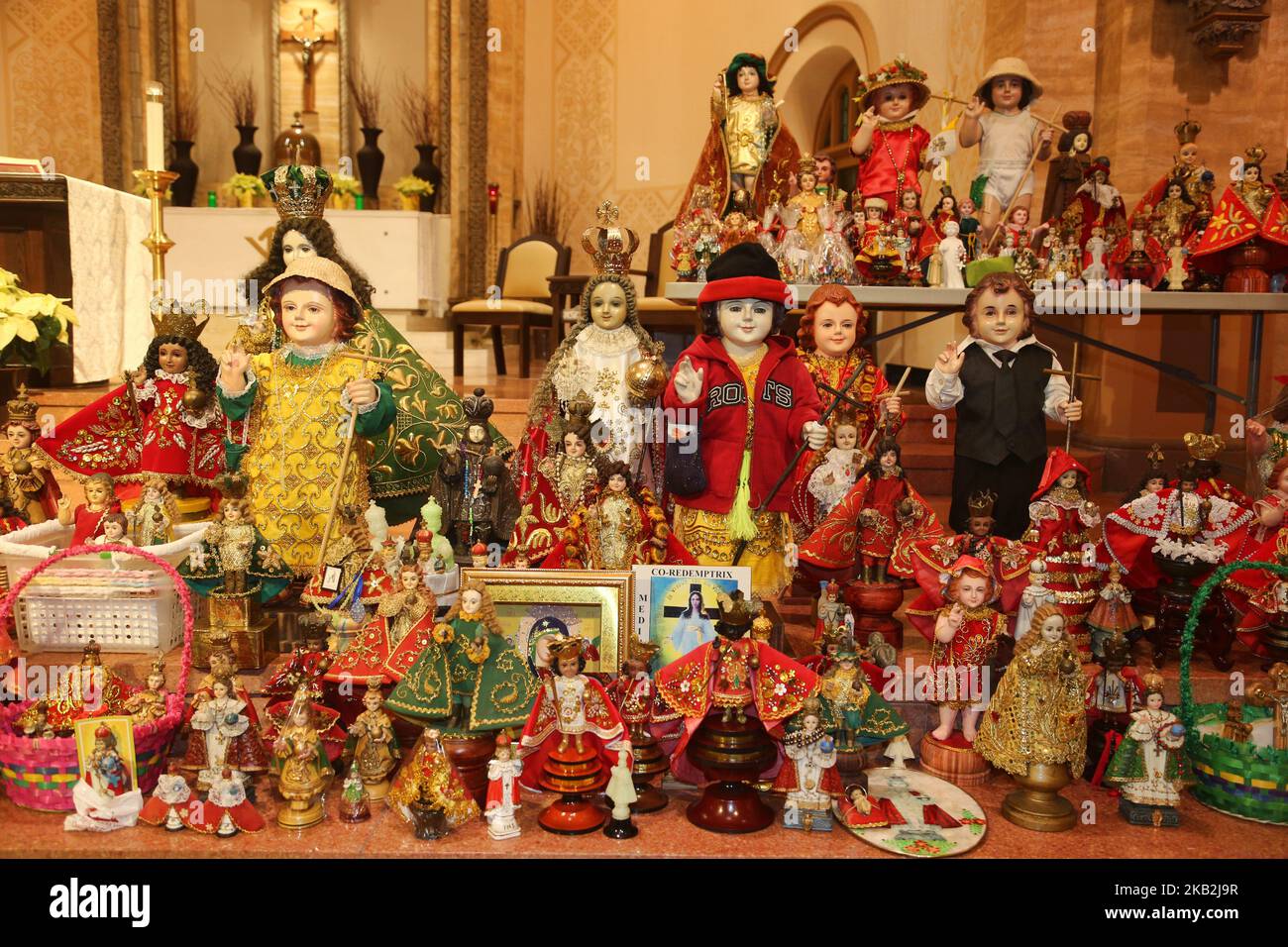 Statues of Santo Niño brought from the homes of Filipino Catholics are ...