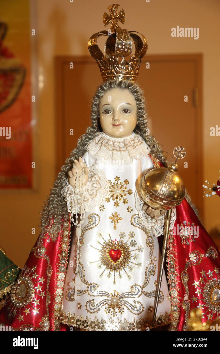 Close-up of a statue of Santo Niño waiting to be blessed during a ...