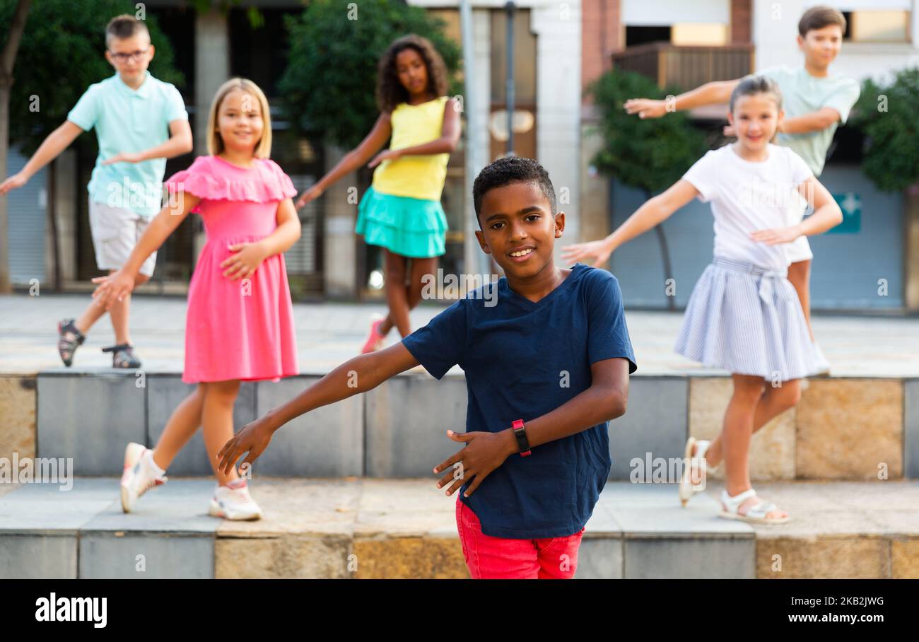 Children exercising contemporary dance moves outdoors Stock Photo - Alamy