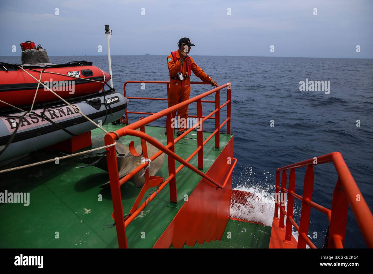 A rescue team is seen near the location of the Lion Air flight JT610 ...