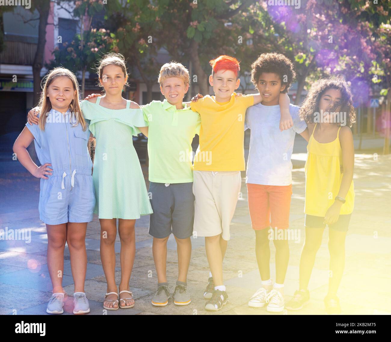 Group photo of positive kids outdoors Stock Photo - Alamy