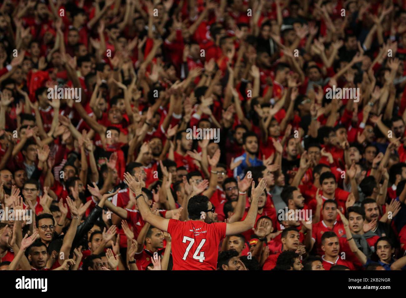 Al-Ahly Fans cheer for their team during their first leg of Final ...