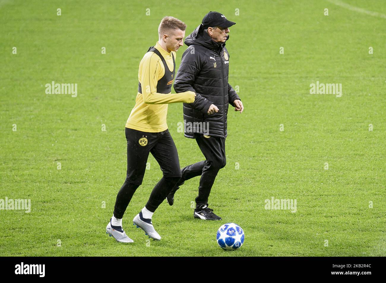 Borussia Dortmund coach Lucien Favre and Lukasz Piszczek during ...