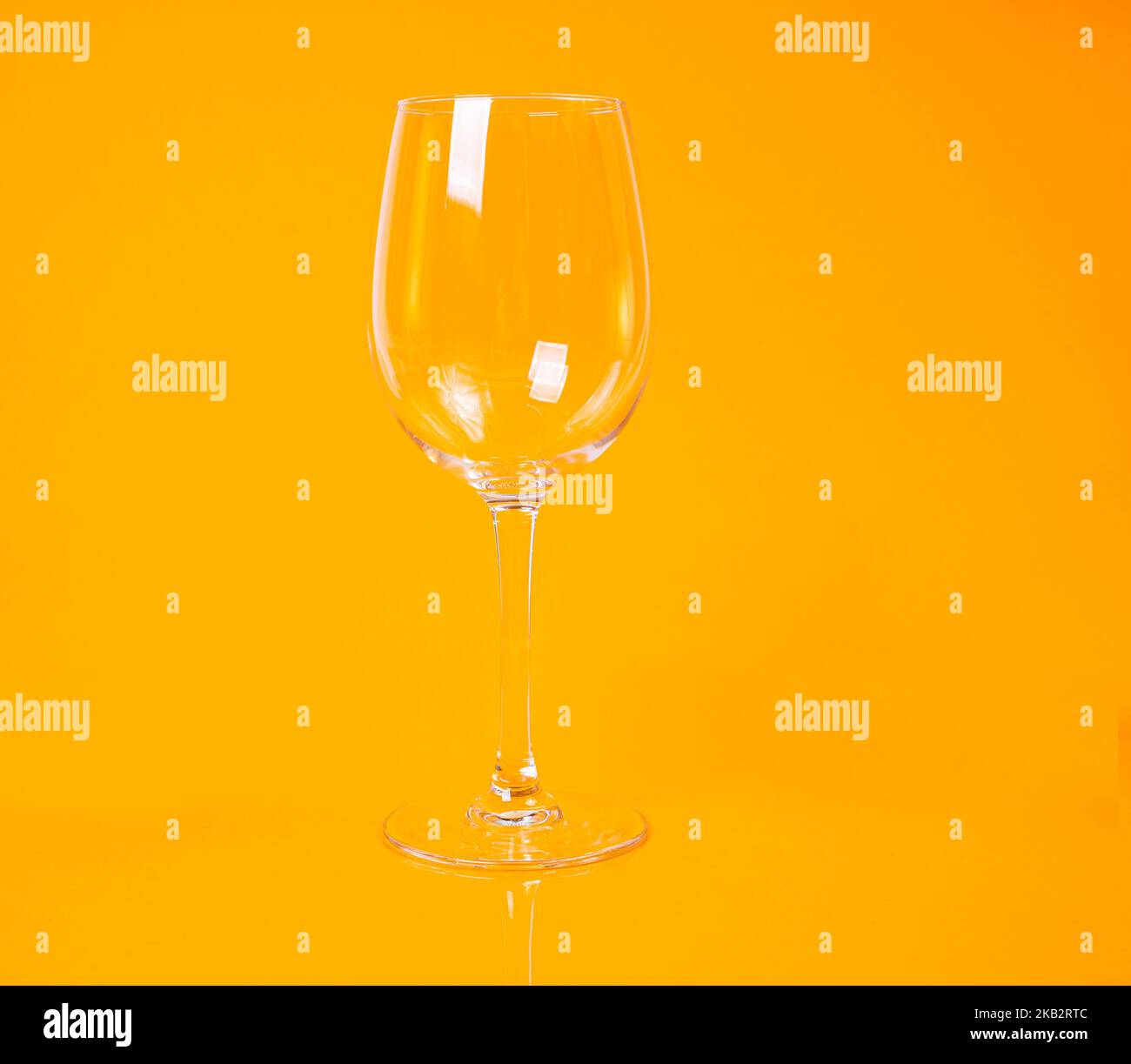 empty glass empty jar empty ice bucket on orange background top front ...