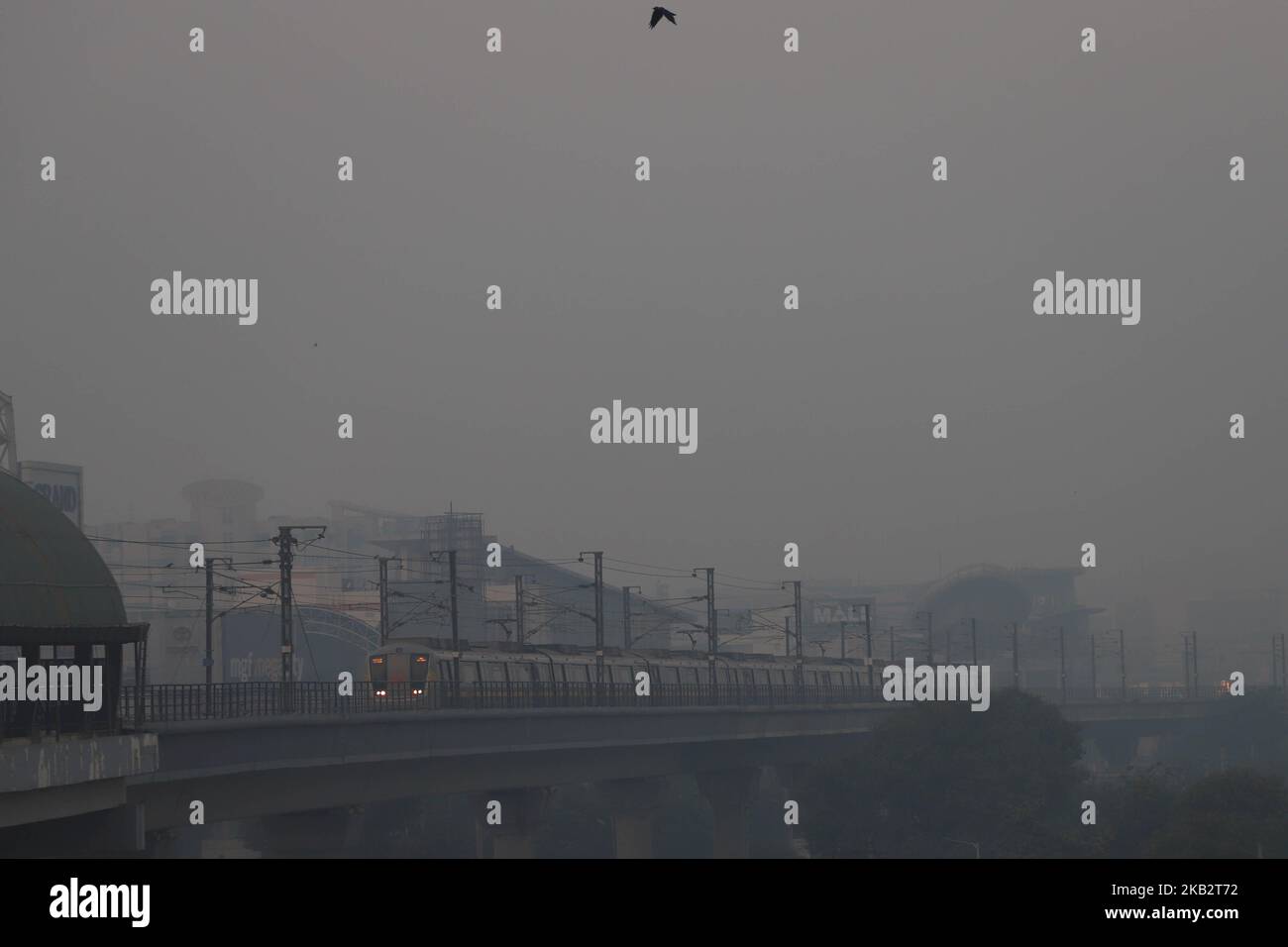 Delhi metro can be seen through thick smog in Gurgaon, Haryana on 6 ...