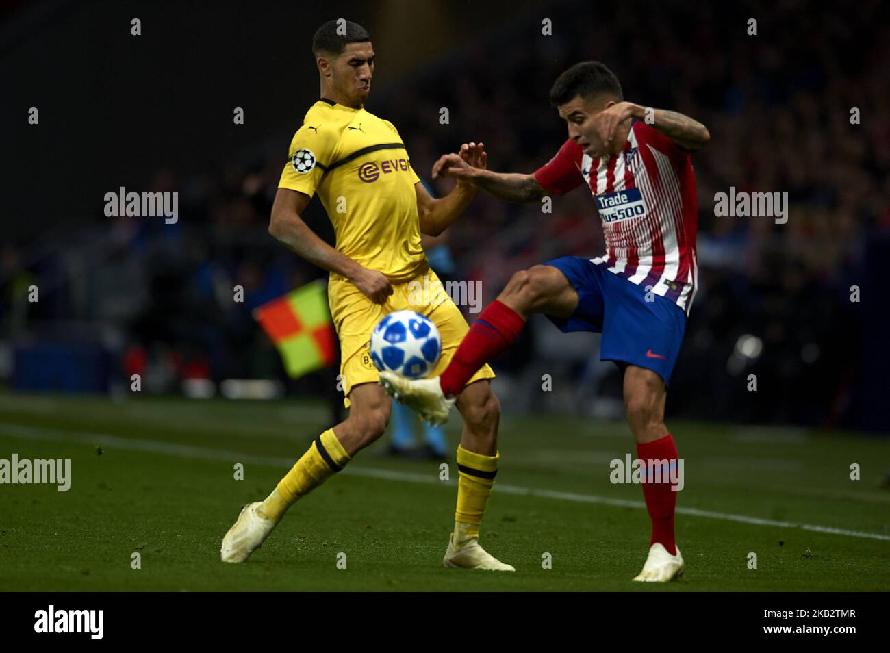 Angel Correa of Atletico Madrid and Achraf Hakimi of Borussia Dortmund ...
