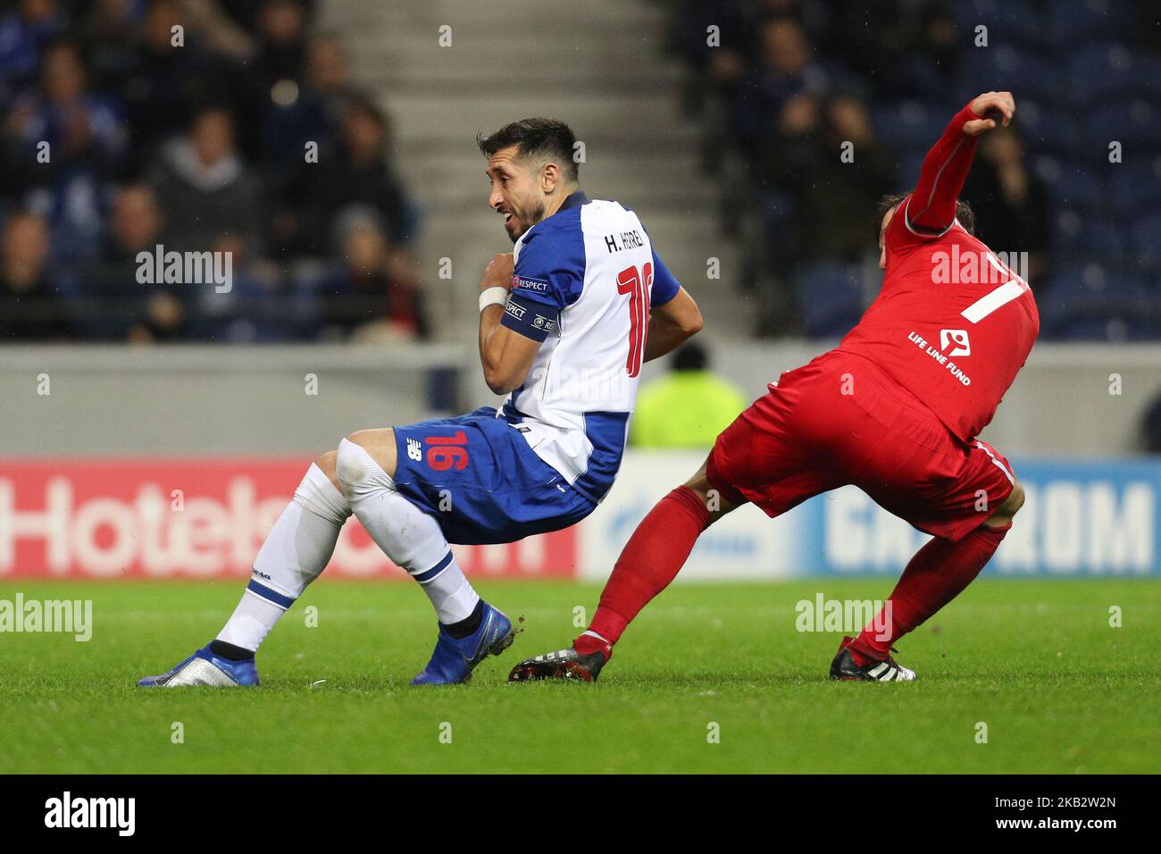 Porto's Mexican midfielder Hector Herrera (L) score a goal during the ...