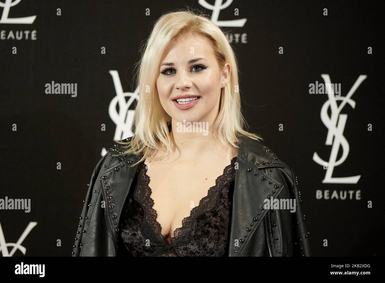 Lucia Gil attends the YVES SAINT LAURENT THE SLIM Rouge PurCouture ...