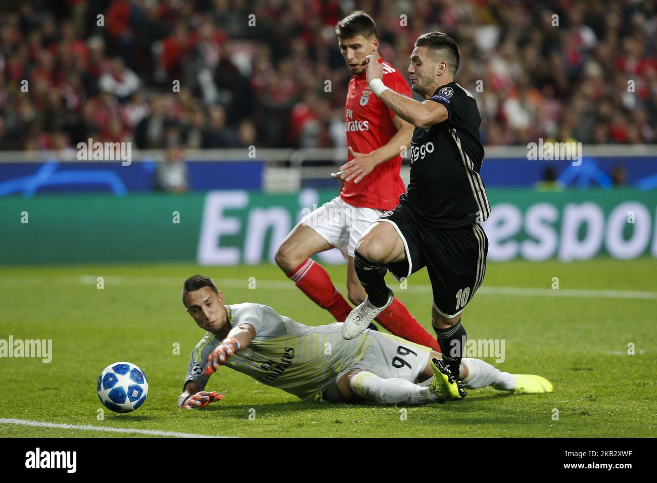 Dusan Tadic of Ajax (R) vies for the ball with Odisseas Vlachodimos of ...