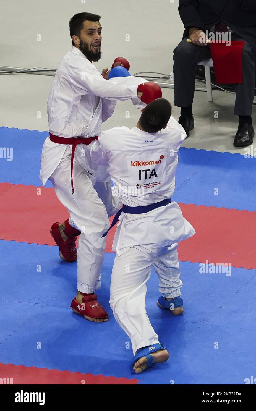 Male karate fight in the elimination round of Kumite by teams during ...