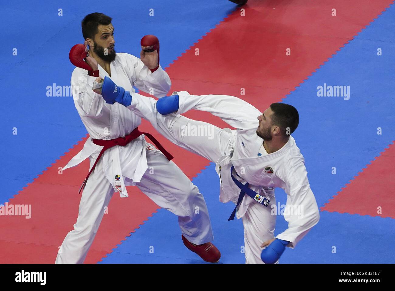 Male karate fight in the elimination round of Kumite by teams during ...