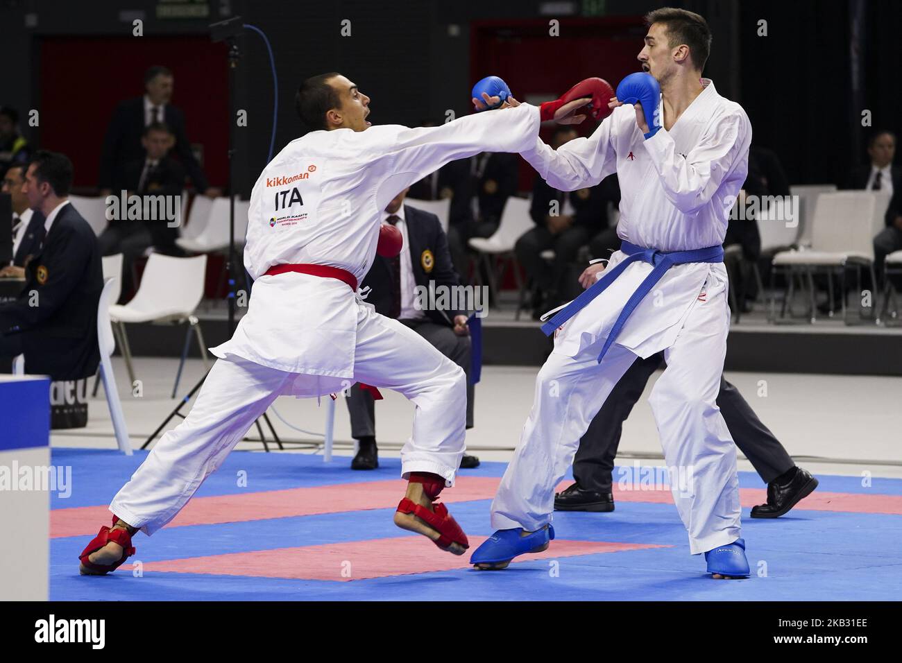 Male karate fight in the elimination round of Kumite by teams during ...