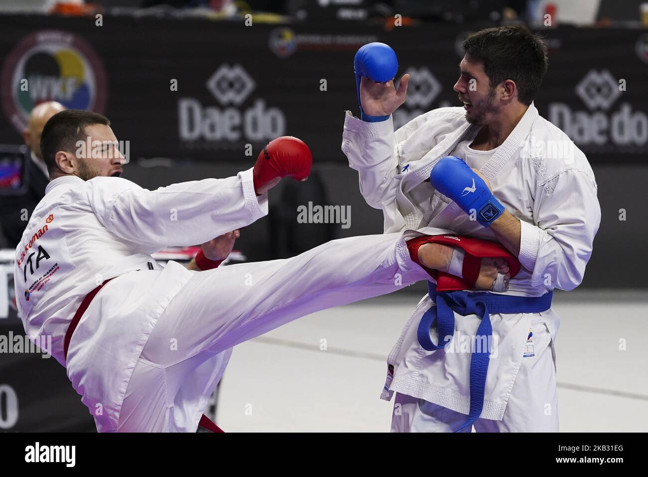 Male karate fight in the elimination round of Kumite by teams during ...