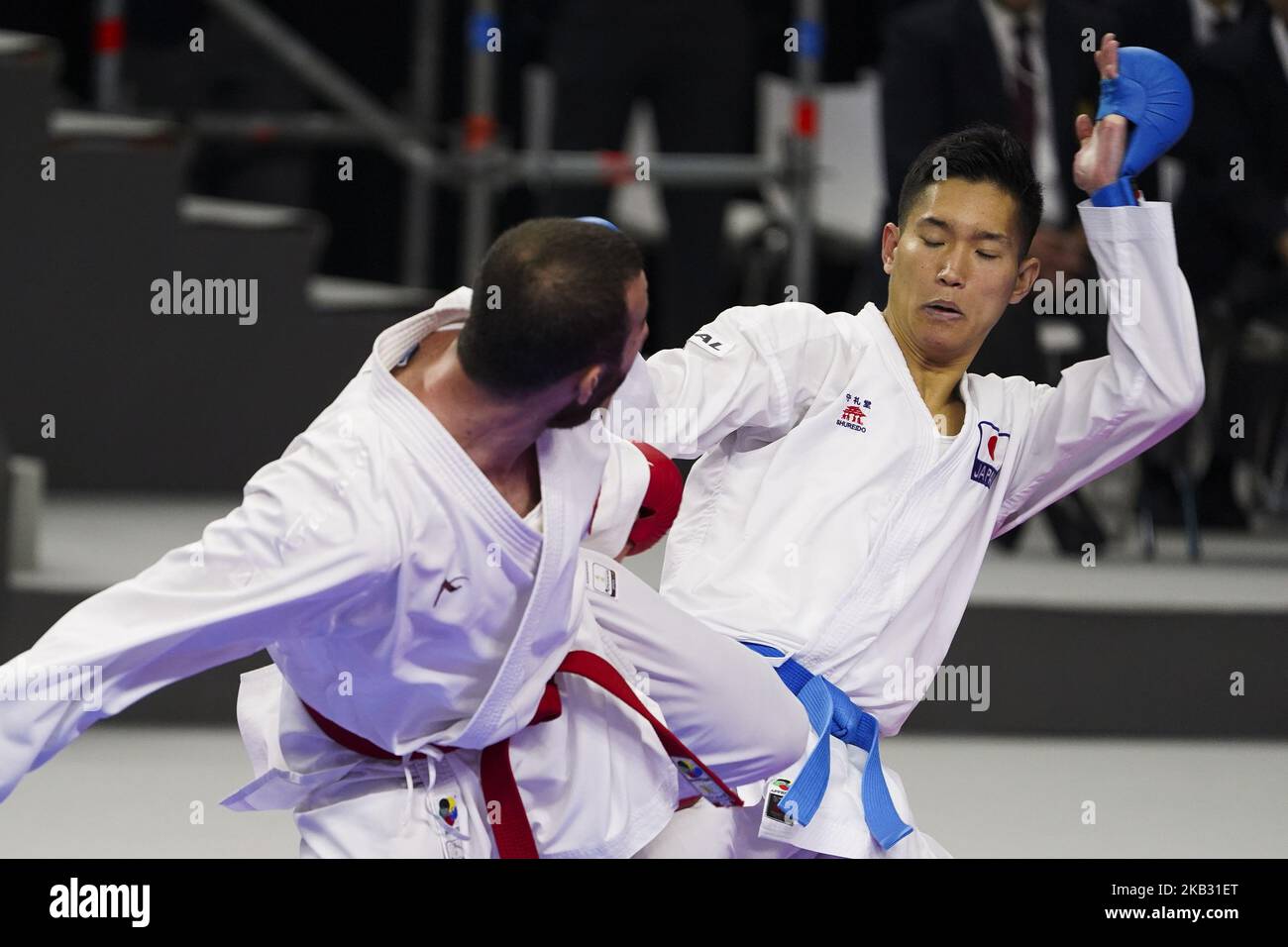 Male karate fight in the elimination round of Kumite by teams during ...