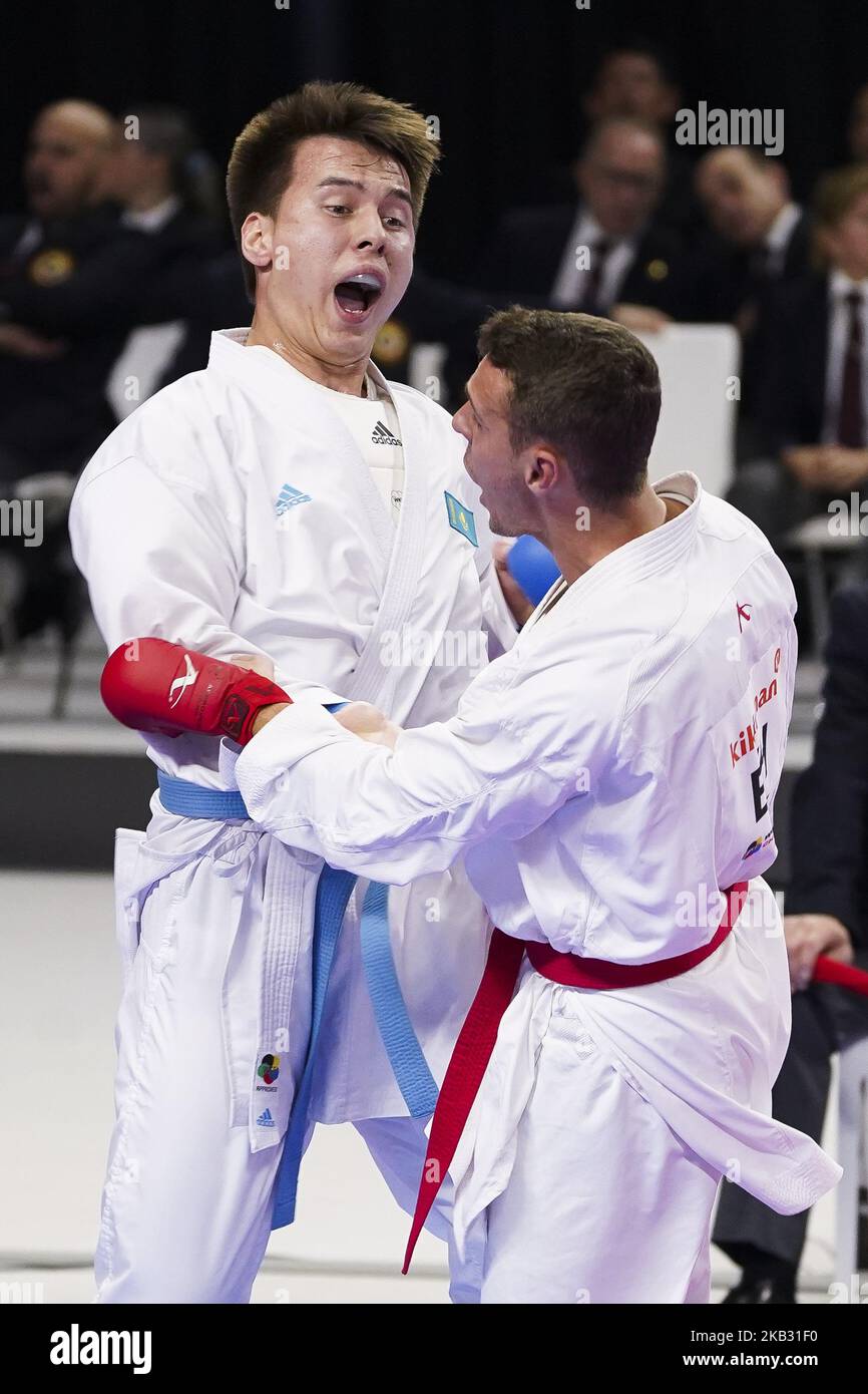 Male karate fight in the elimination round of Kumite by teams during ...