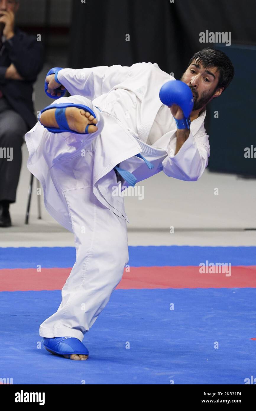 Male karate fight in the elimination round of Kumite by teams during ...
