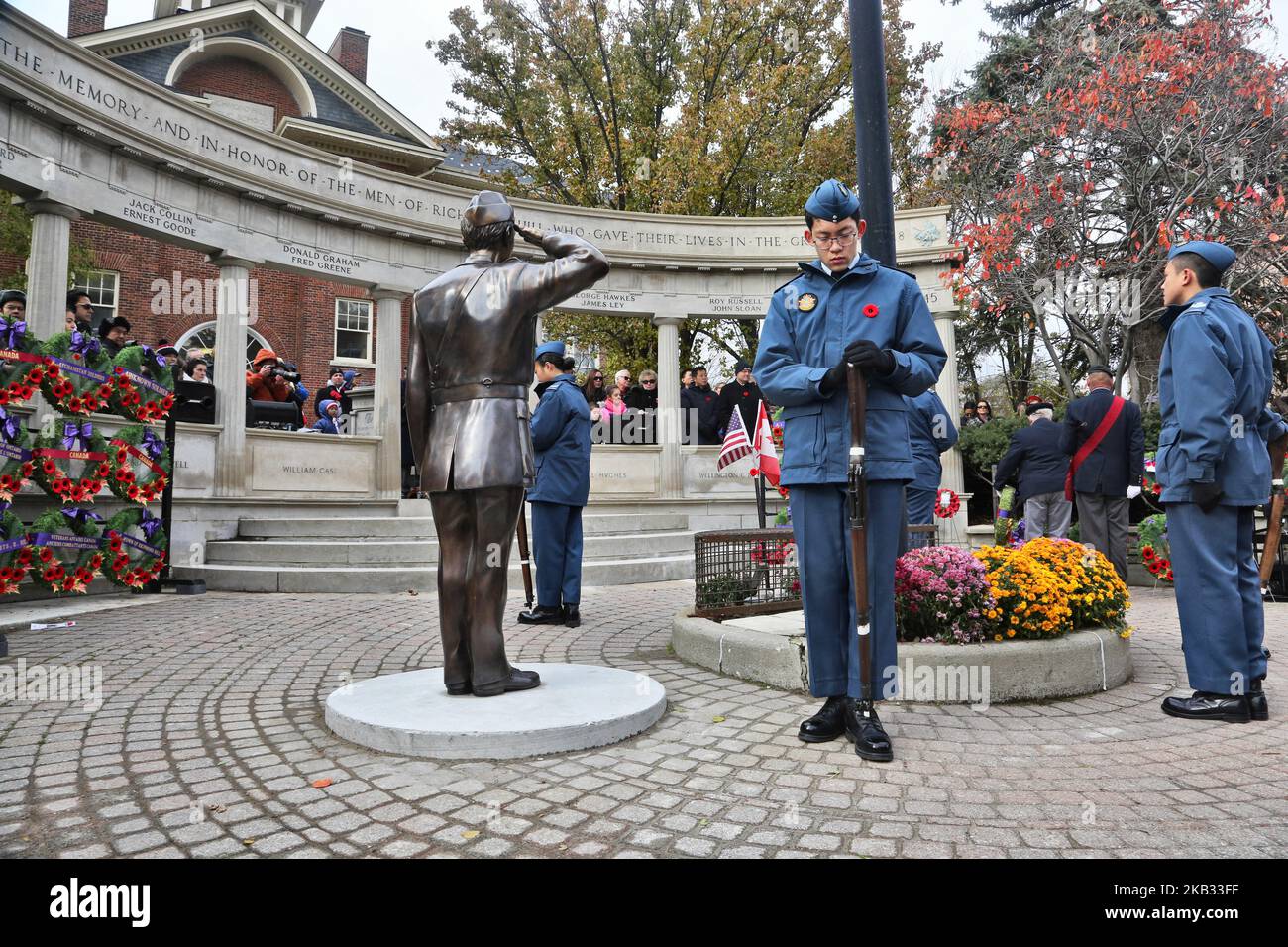 Canadians commemorate members of the military who served in past and ...