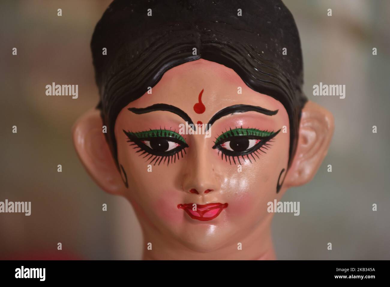 A clay idol of the Hindu Goddess Chhathi Maiya (Goddess of Power) for ...