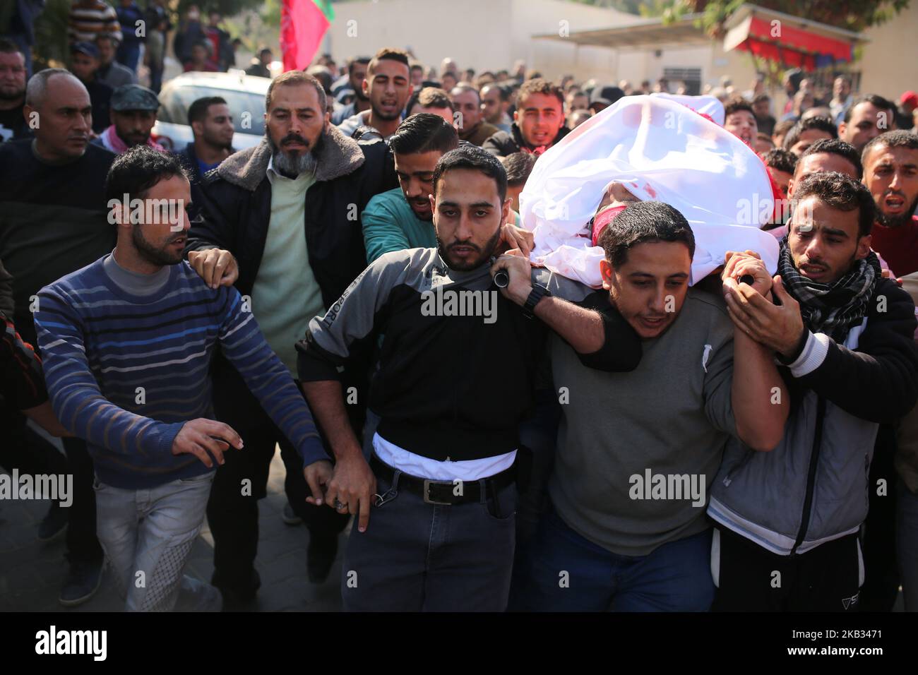 Mourners carry the body of Palestinian militant Mohammed Al Taatri, who ...
