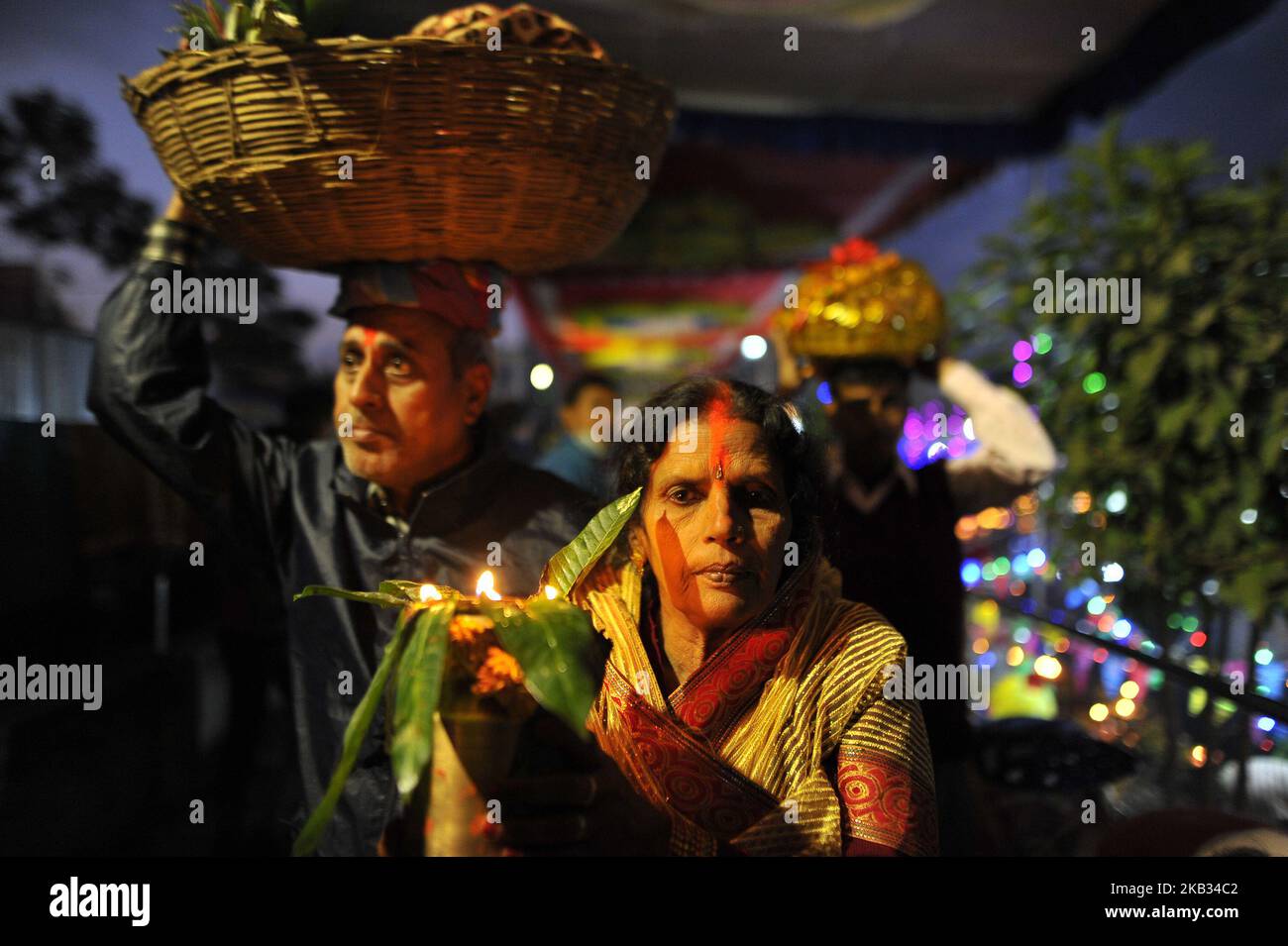 Nepalese Devotees offering ritual prayer during Chhath Puja Festival at ...