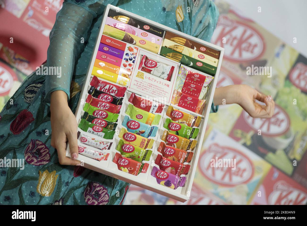 Model Nicole Fujita poses with a limited edition of 35-piece assortment Kit Kats, celebrating ...