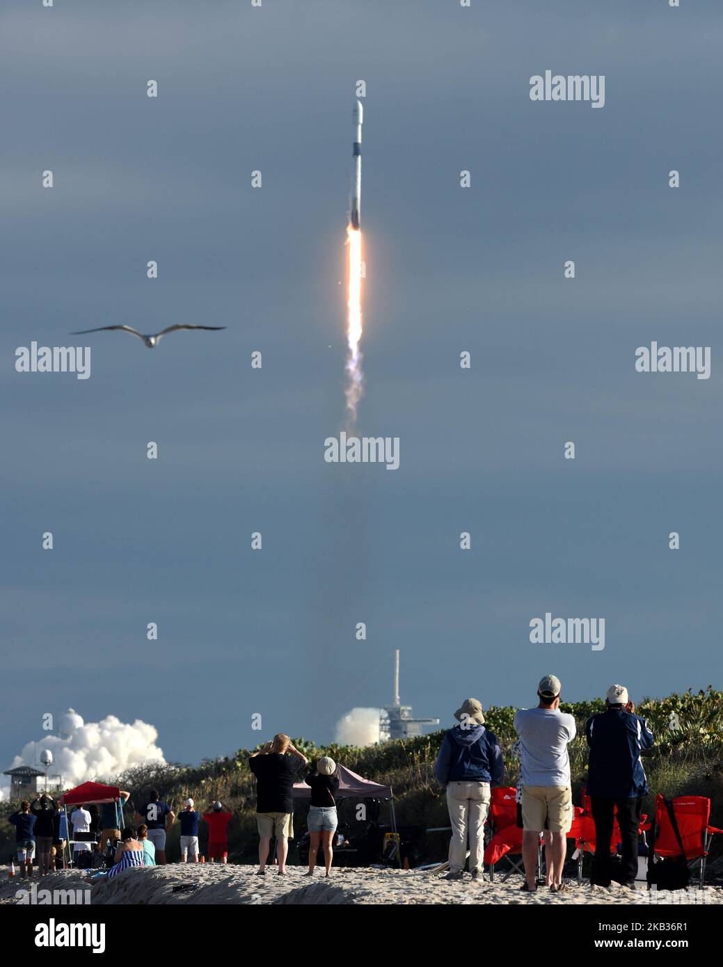 People watch from Playalinda Beach at Canaveral National Seashore as a ...