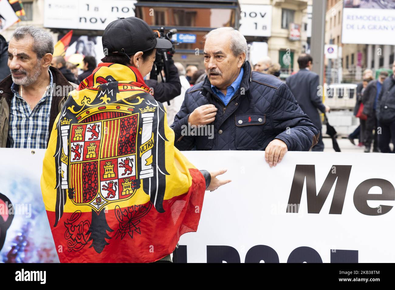 A supporter of Franco wears the pre-constitutional Spanish flag during ...